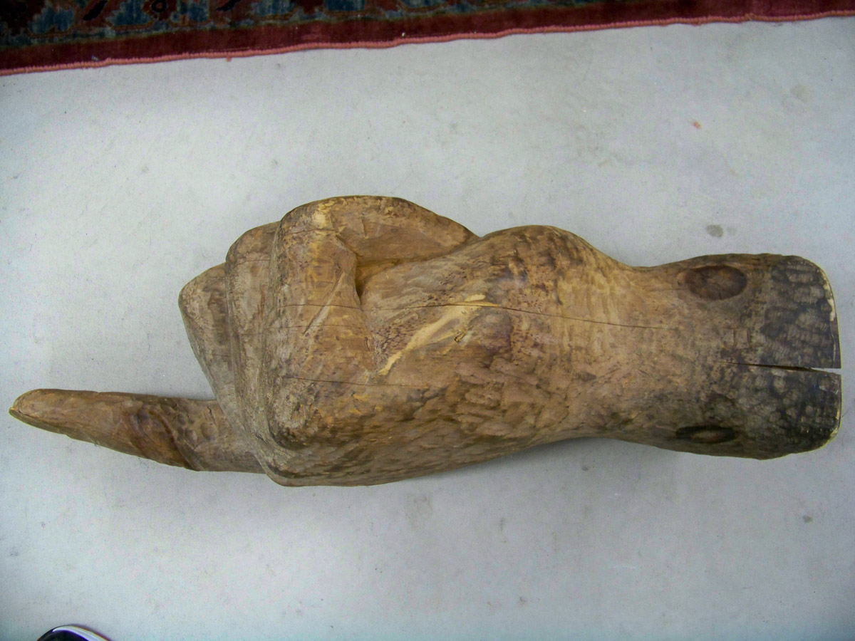 LARGE CARVED FULL HAND WITH POINTING FINGER TRADE SIGN.